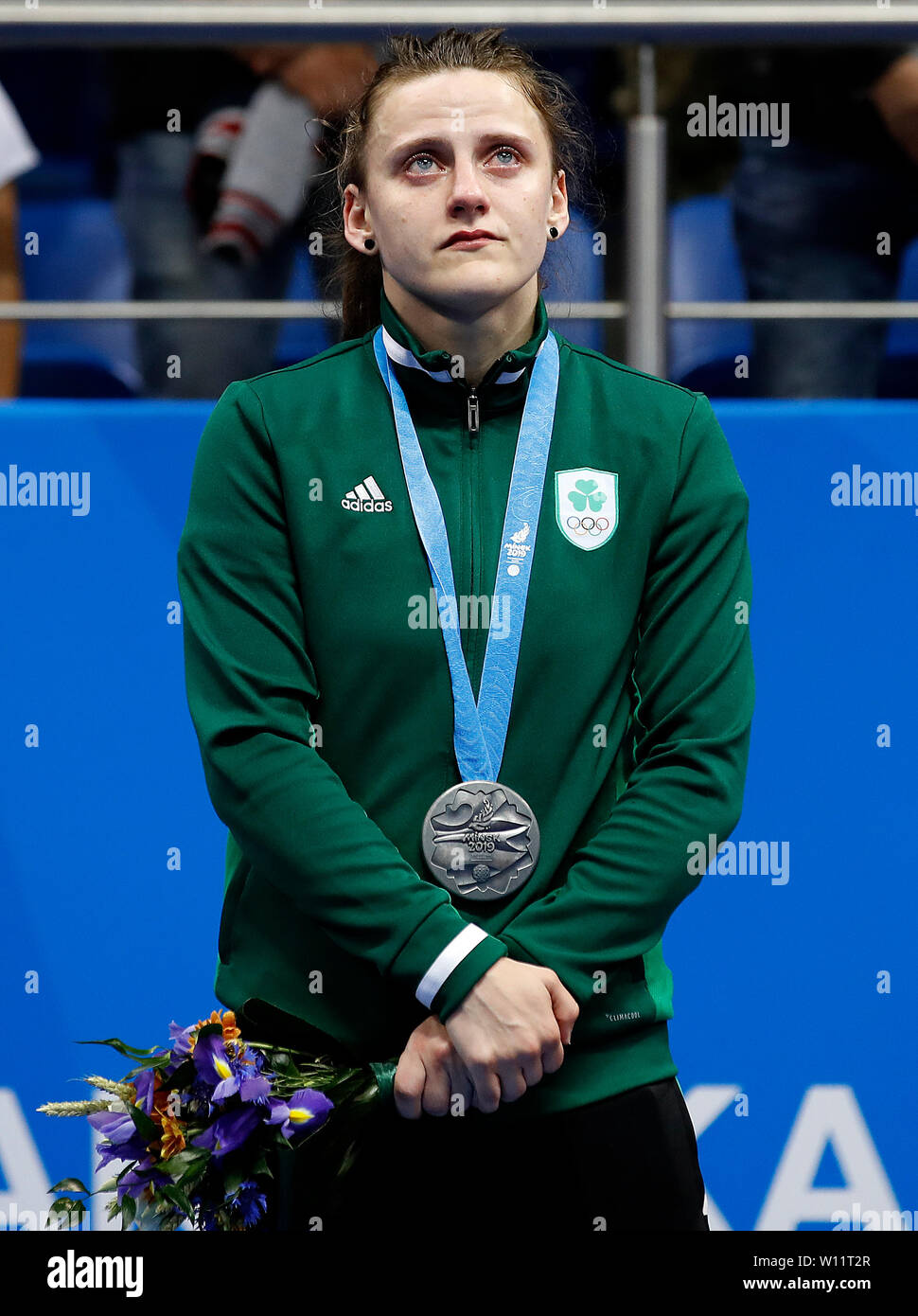 Ireland's Michaela Walsh stands on the podium with her Silver medal ...