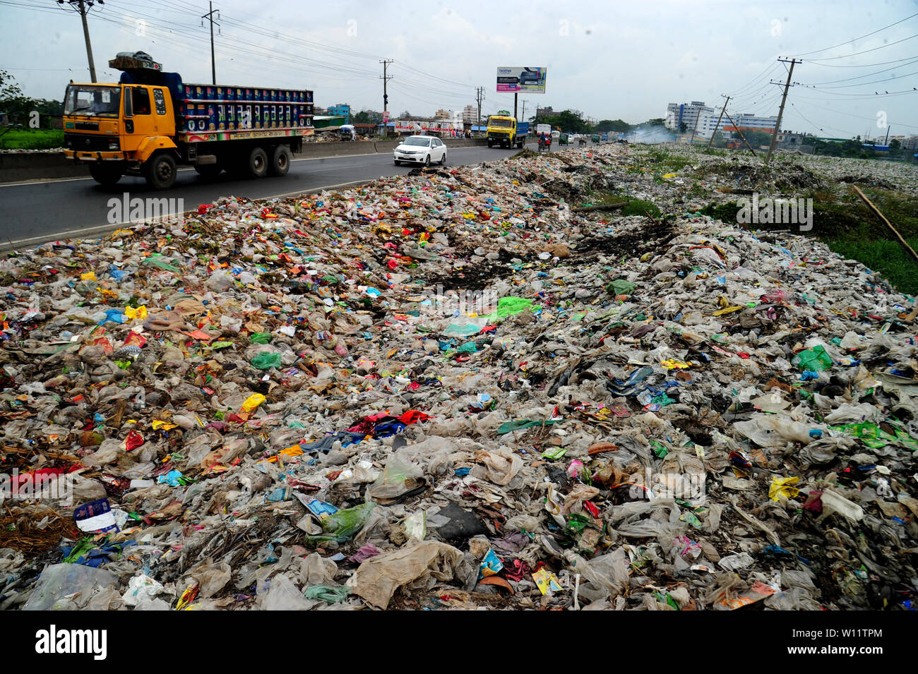 Wastage dump yard near road in Nararyanganj, Bangladesh Stock Photo - Alamy