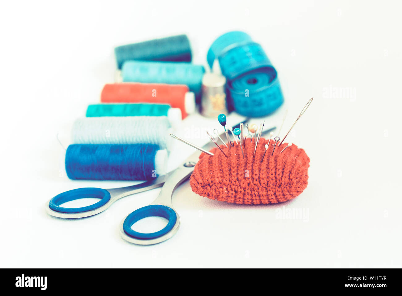 Tools for needlework, red knitted needle pad for sewing, scissors and ...