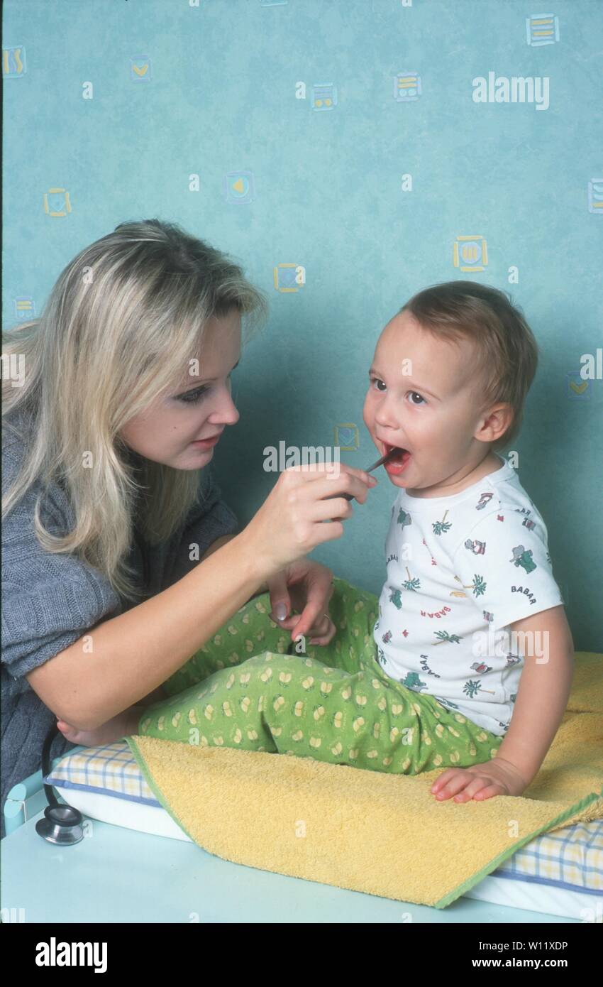 Baby getting Checkup Stock Photo - Alamy