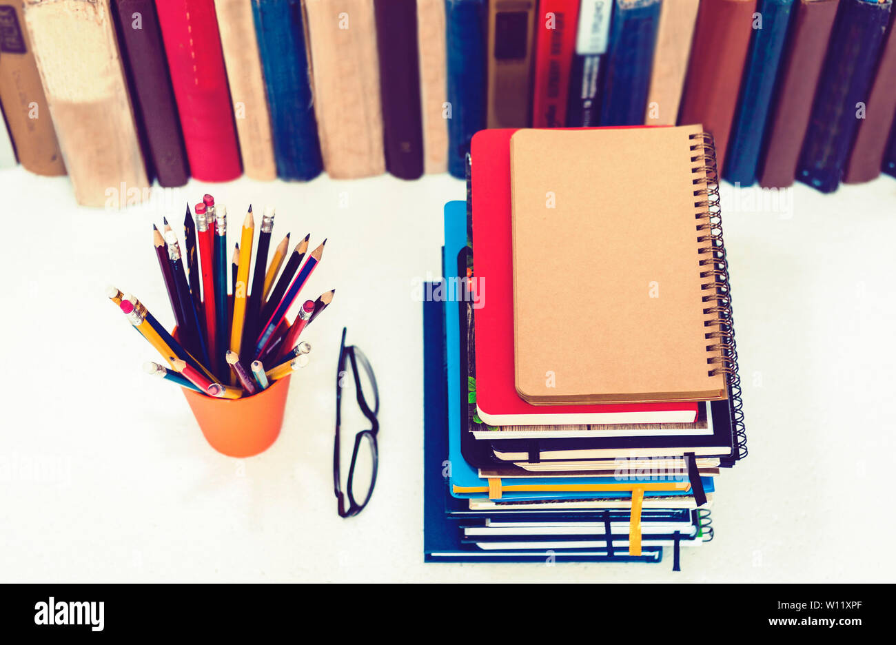 Notebooks piles, stack of books education back to school background ...