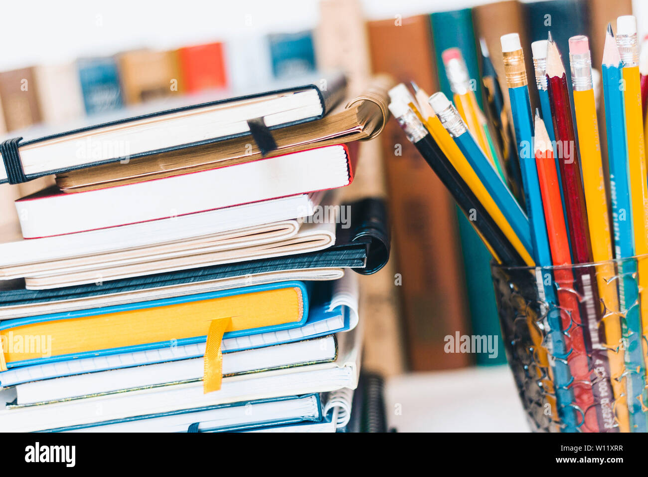 Notebooks piles, stack of books education back to school background ...