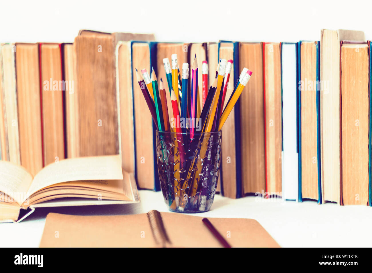 Open textbook, notebook, stack of books education back to school ...