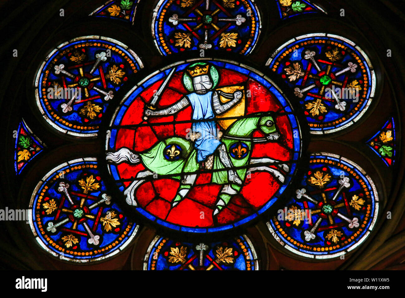 Stained Glass in the Cathedral of Notre Dame, Paris, France, depicting ...