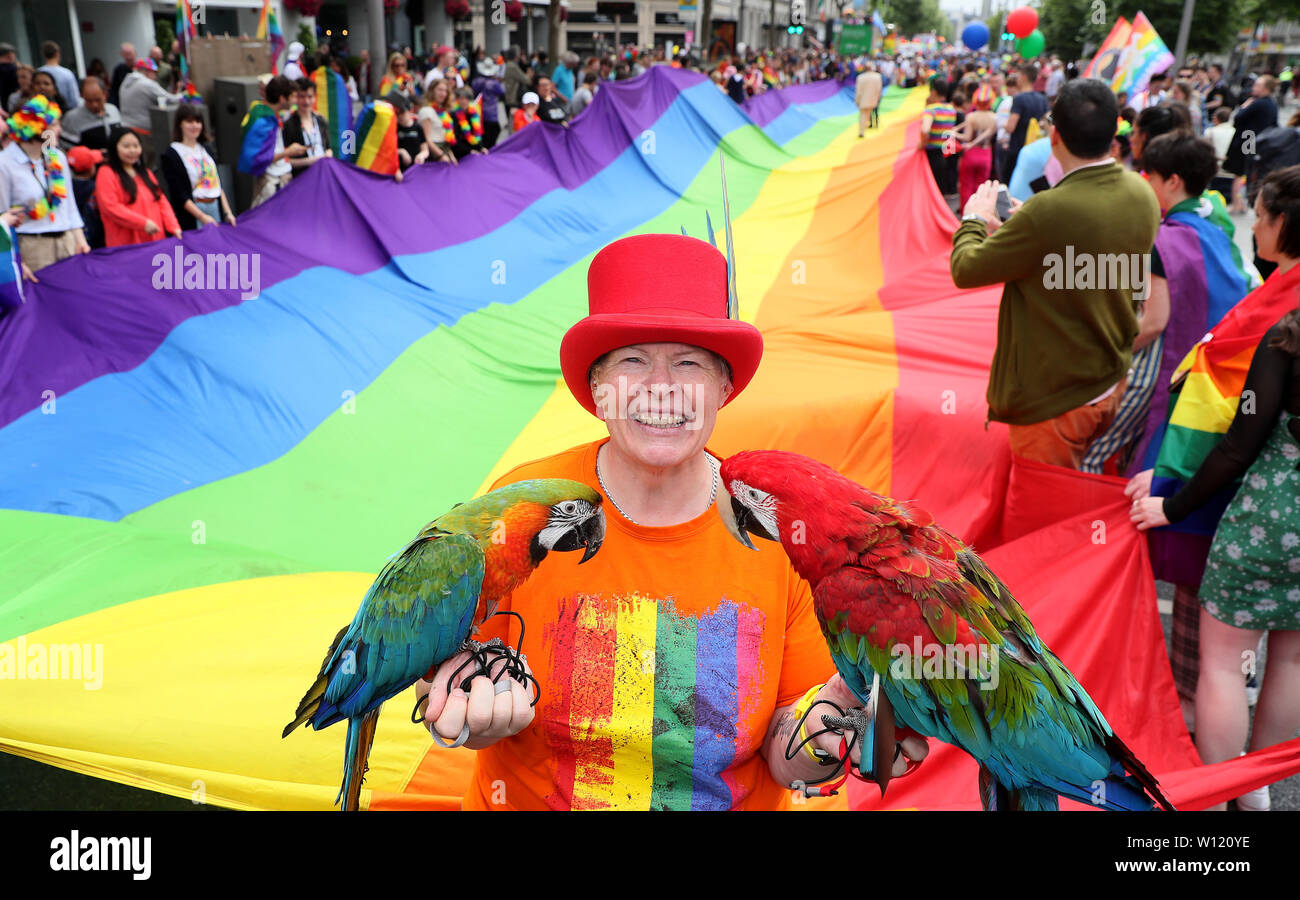 Barbara Doyle, from Coolock, with her macaw's Quinn (left) and Rosie as ...