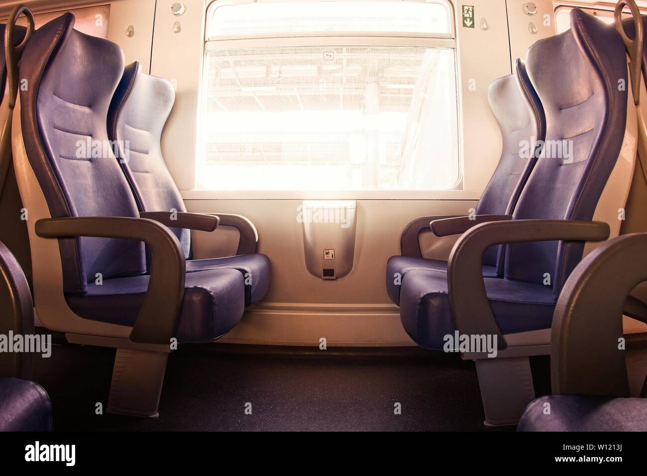 Interior of a passenger train with empty seats Stock Photo - Alamy