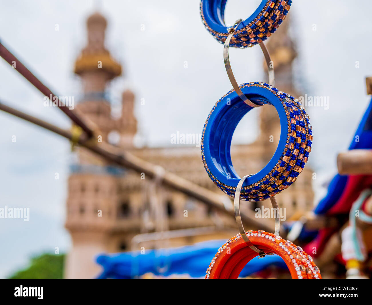 Blue colored bangles with Charminar in background Stock Photo - Alamy