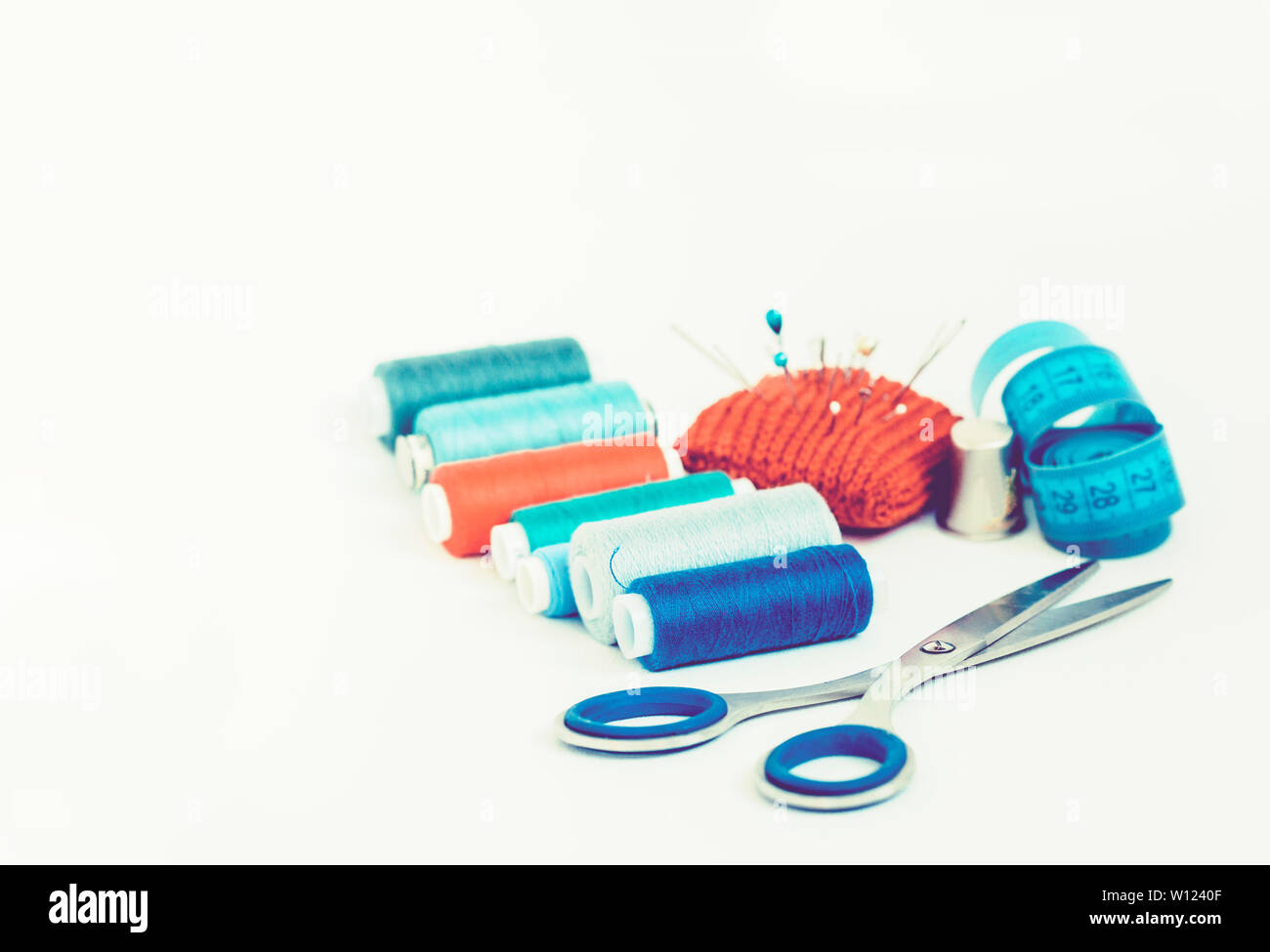 Tools for needlework, red knitted needle pad for sewing, scissors and ...