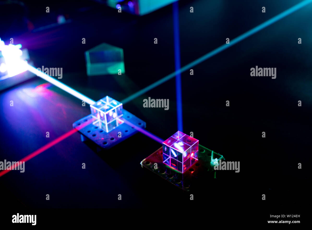 Laser beams in the laboratory of optical physics Stock Photo - Alamy
