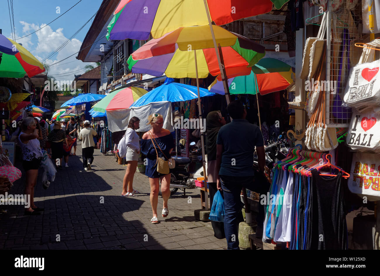 Tourists shopping in Ubud old craft market, Bali, Indonesia Stock Photo ...