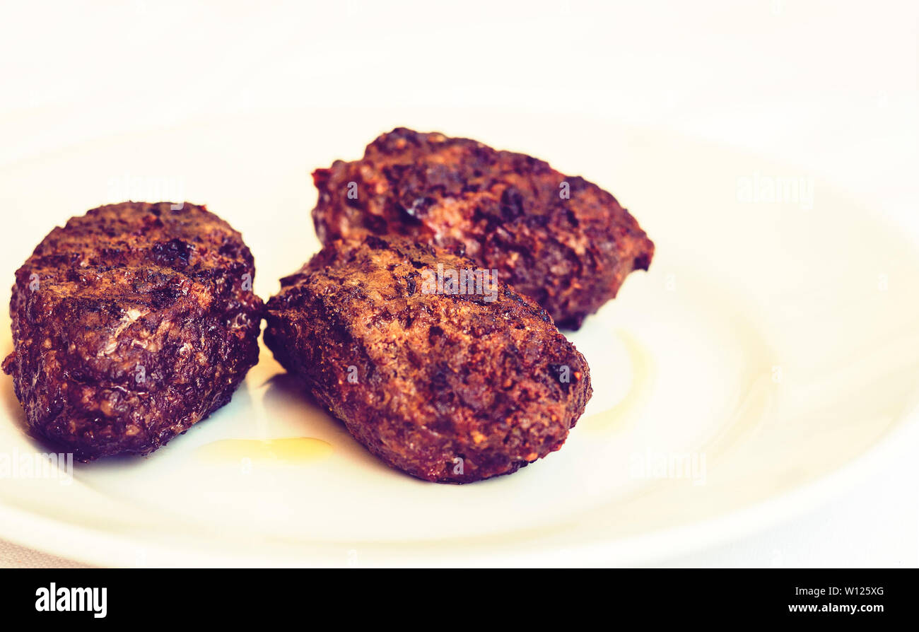 homemade fried minced meat balls horsemeat on white plate, traditional ...