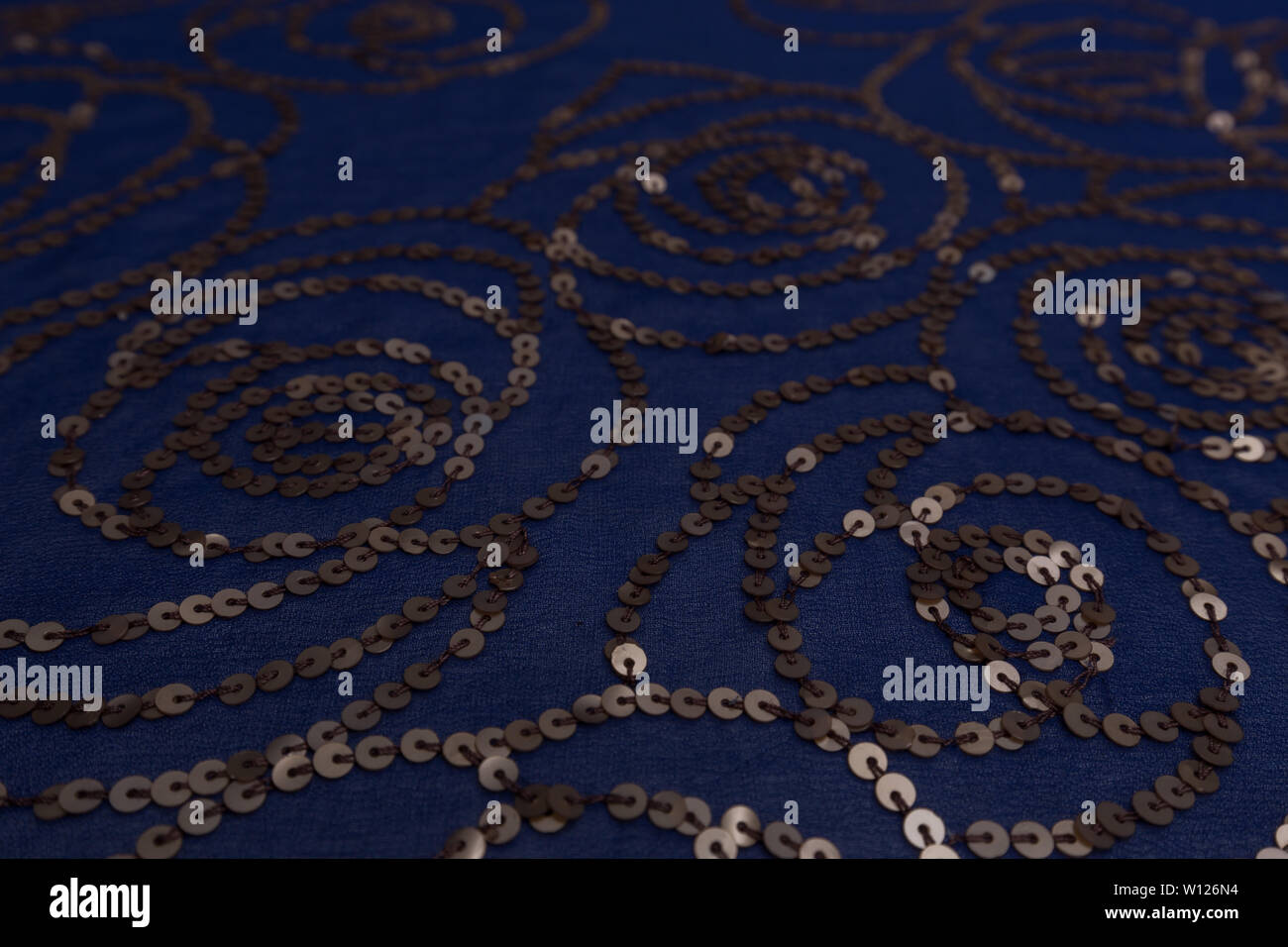 Beautiful fabric with plastic decoration and textile texture background ...