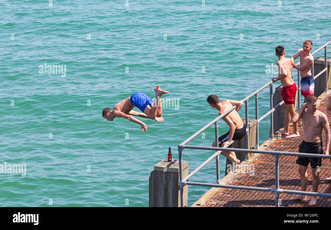 Diving off pier hi-res stock photography and images - Alamy
