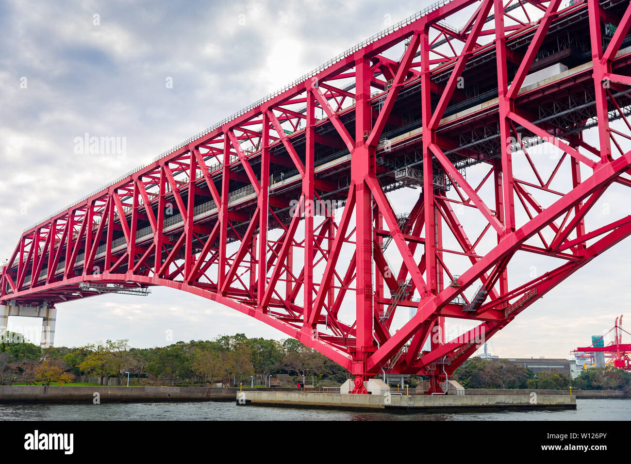 Red Minato bridge, double-deck truss bridge in Osaka, Japan. Upper is ...