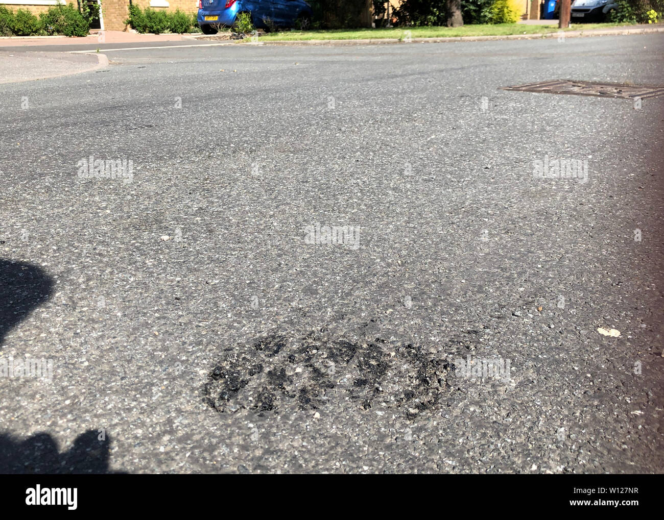 Melted tarmac in Bracknell, Berkshire as a new record temperature has ...