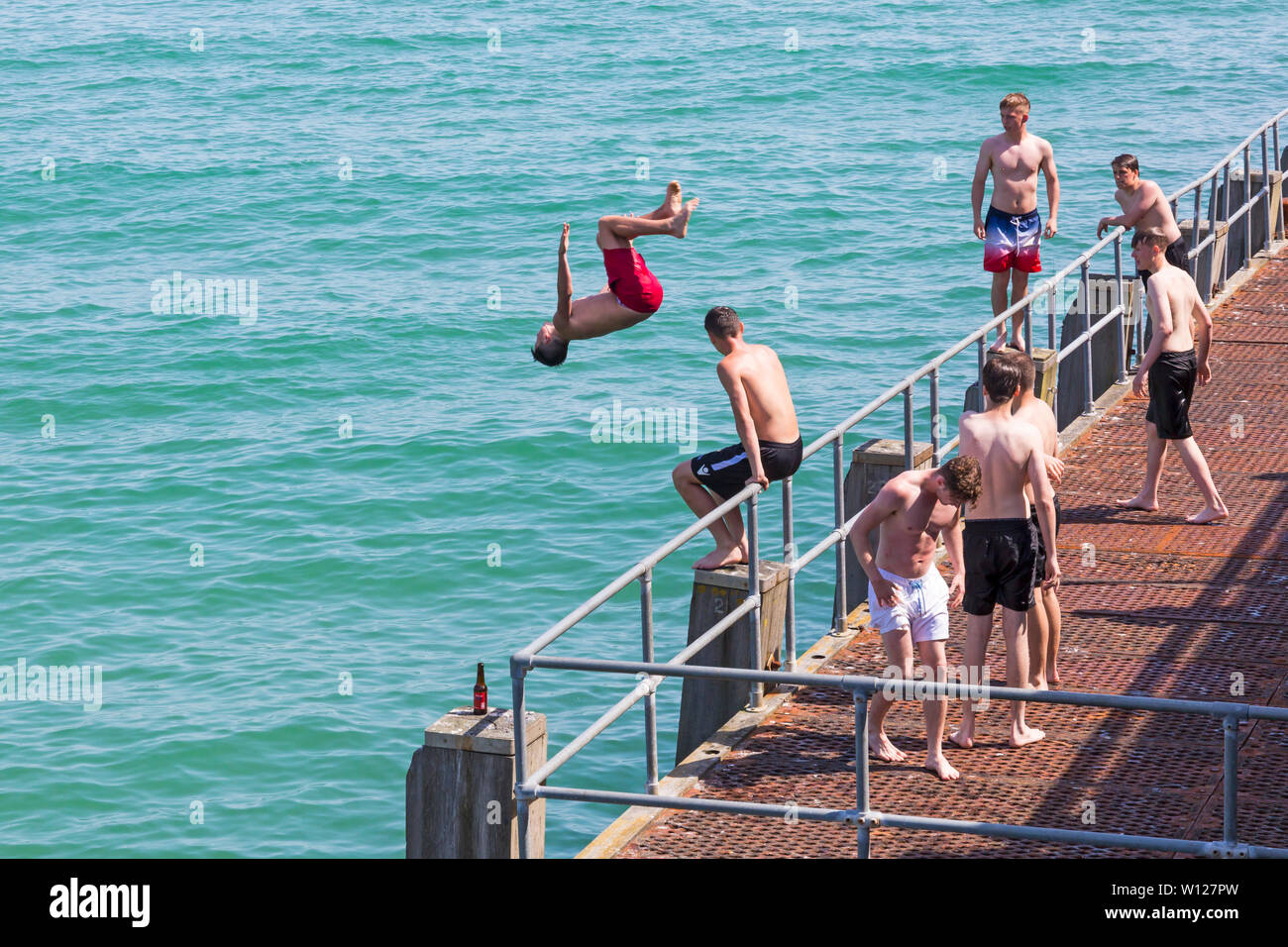 Diving off pier hi-res stock photography and images - Alamy