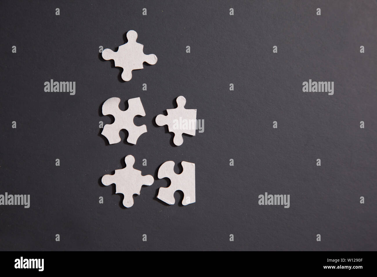 Jigsaw puzzle pieces connected together hi-res stock photography and ...