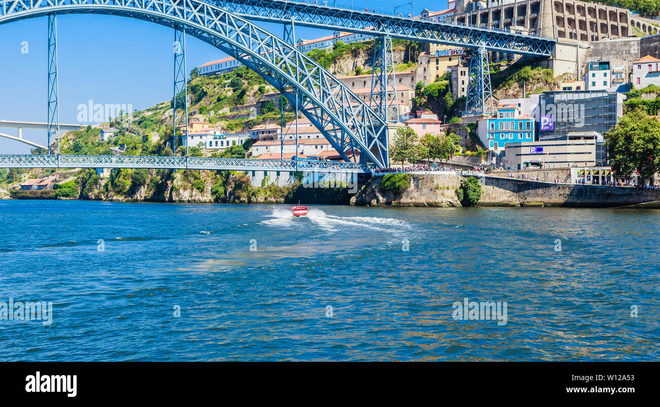 Famous steel bridge dom Luis above connects Old town Porto with Vila ...