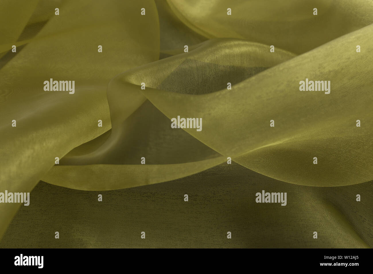 Beautiful close up of yellow silk fabric with textile texture ...