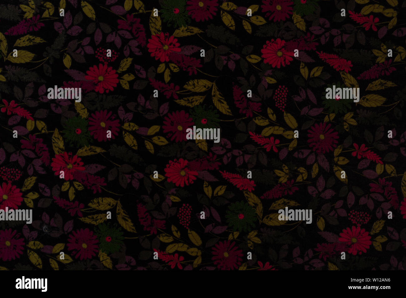 Beautiful overview of dark fabric with floral patterns Stock Photo - Alamy