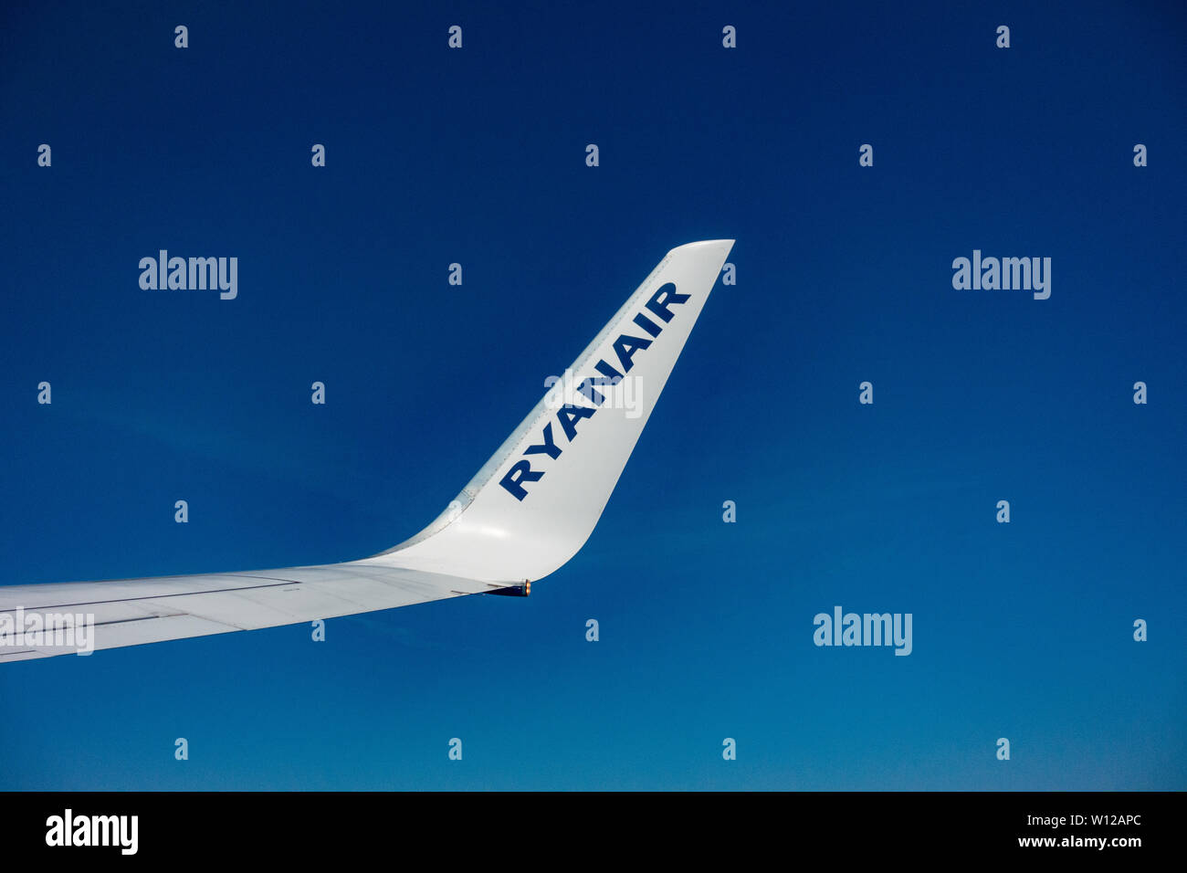 A Ryanair 737 - 800 wing and wing tip with the French Mediterranean ...