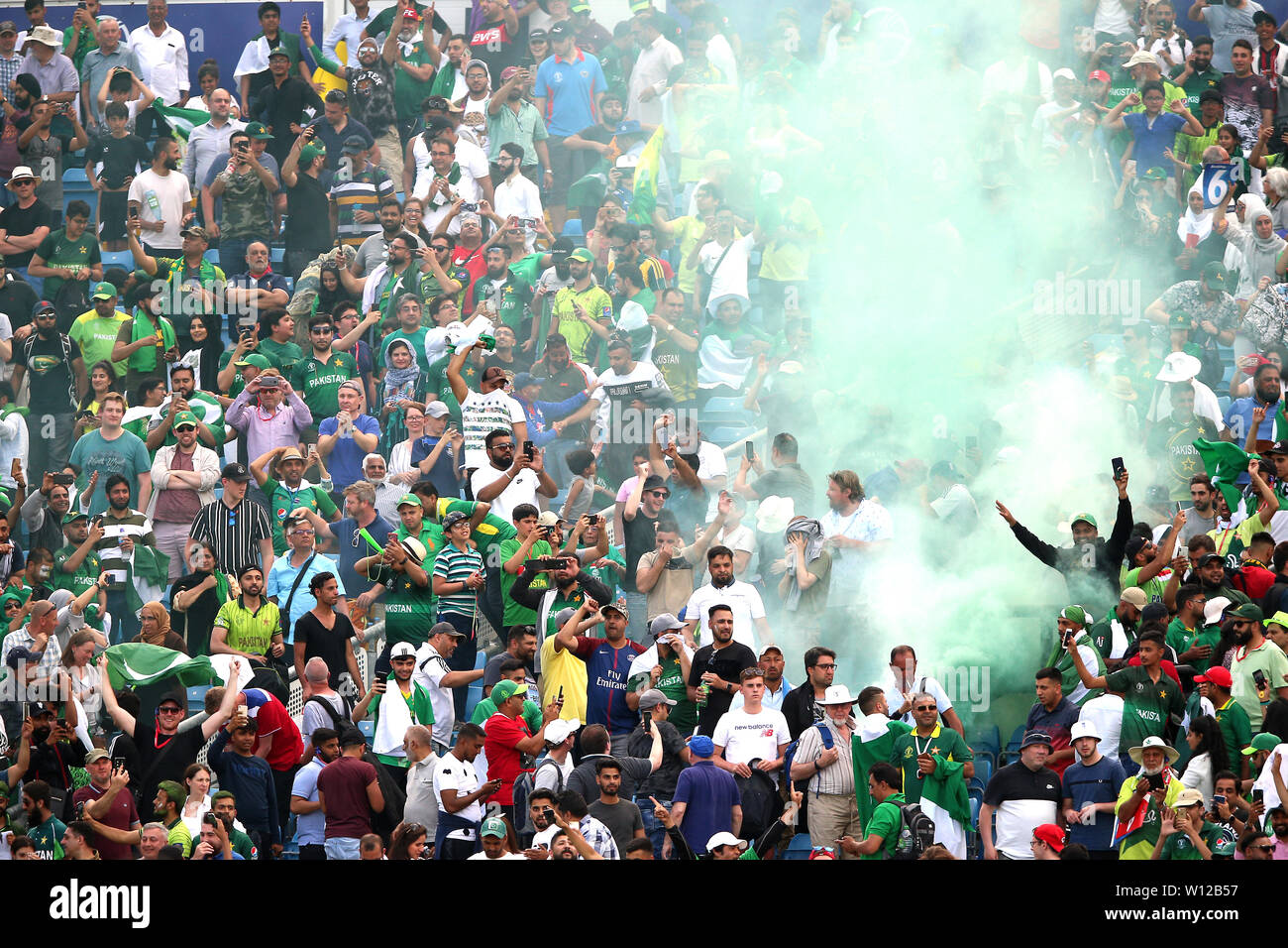 Fans set off flares in the stands during the ICC cricket World Cup ...