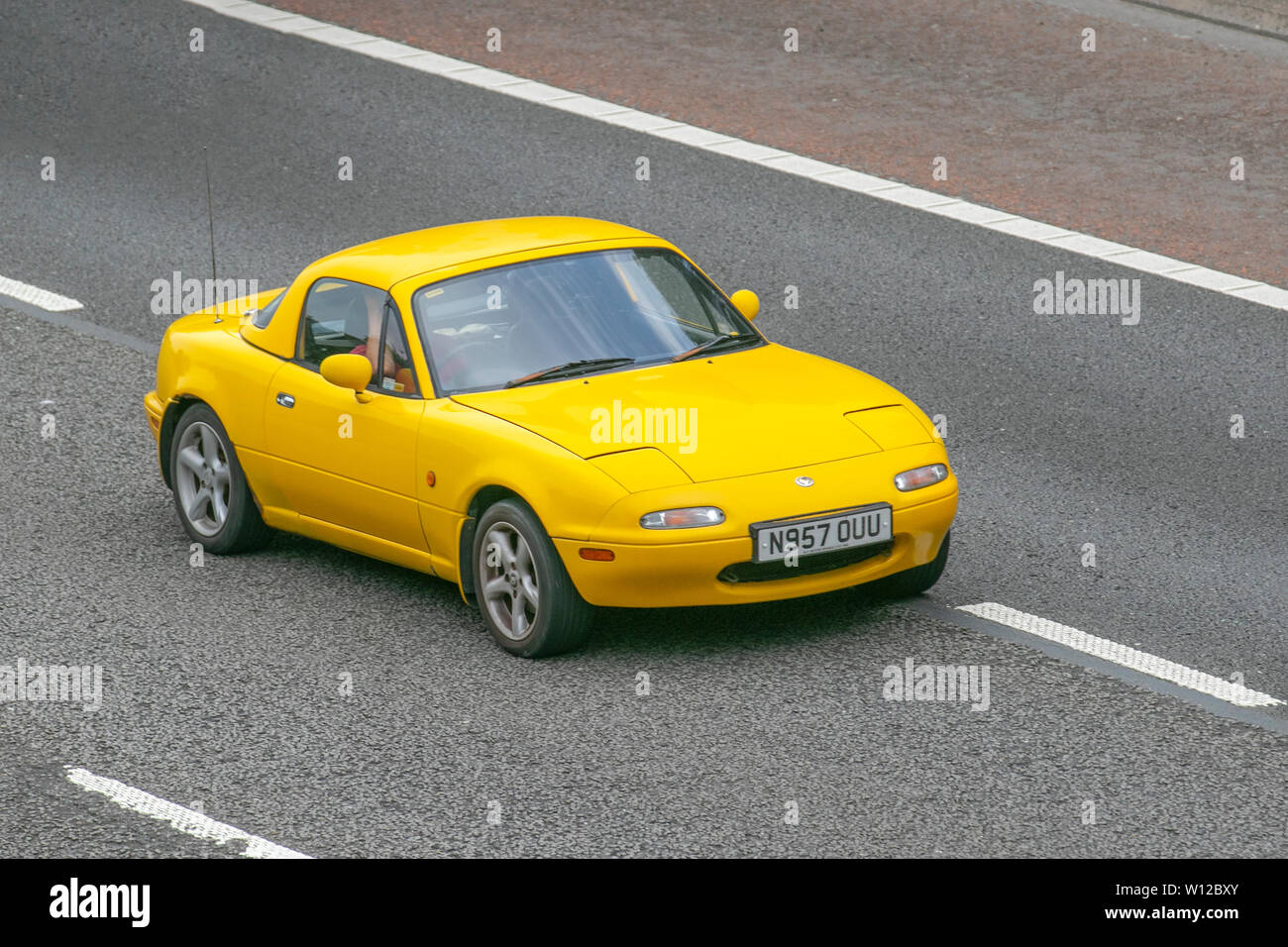 1995 yellow Mazda Mx-5 California; M6, Lancaster, UK; Vehicular traffic ...