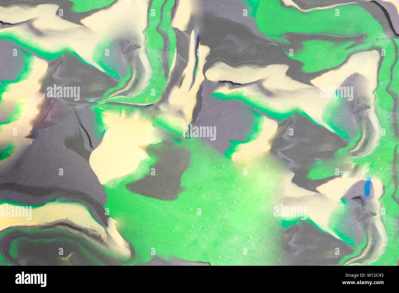 Multicolored background with fingerprints made from plasticine. Play ...