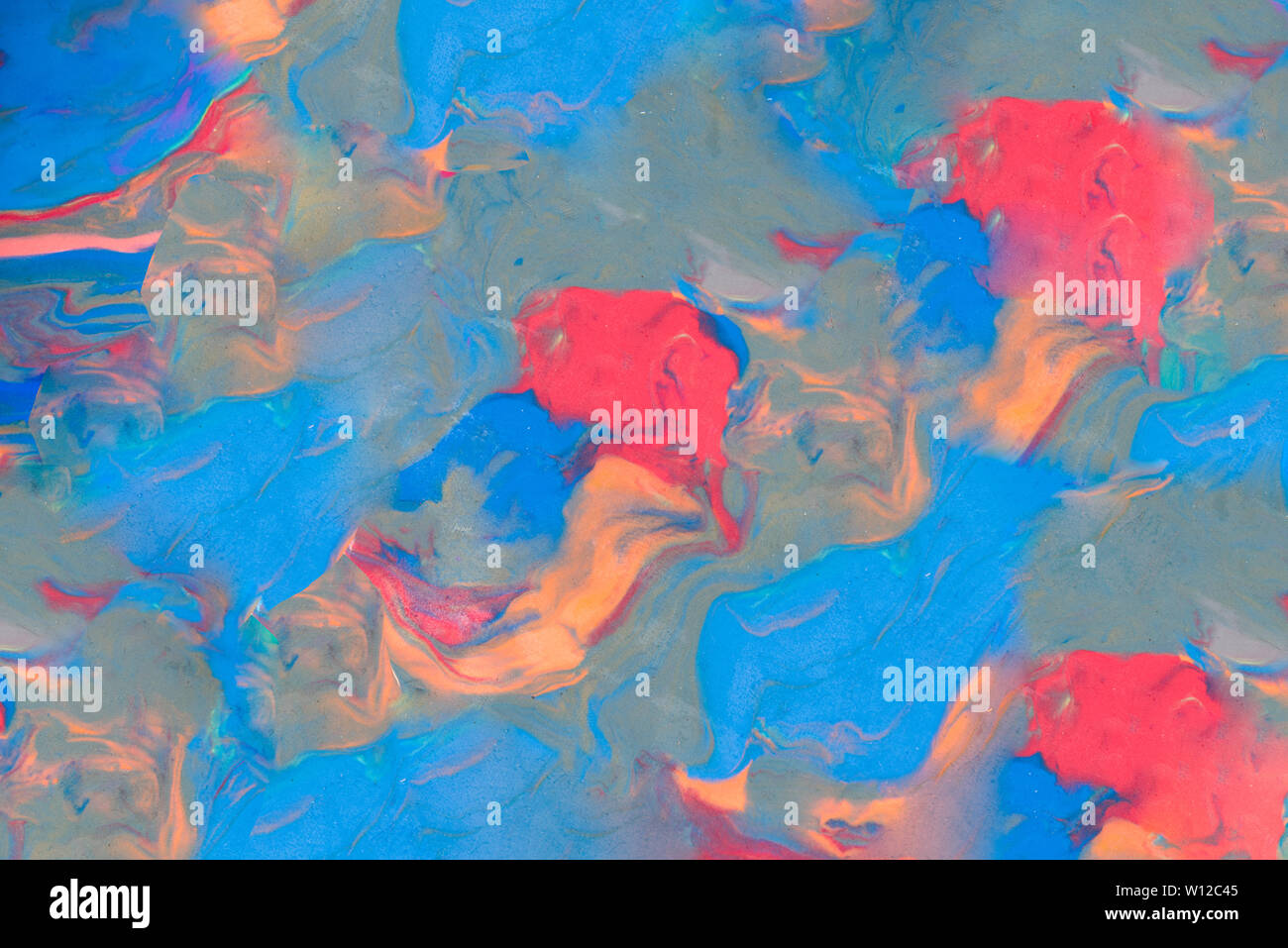 Multicolored background with fingerprints made from plasticine. Play ...