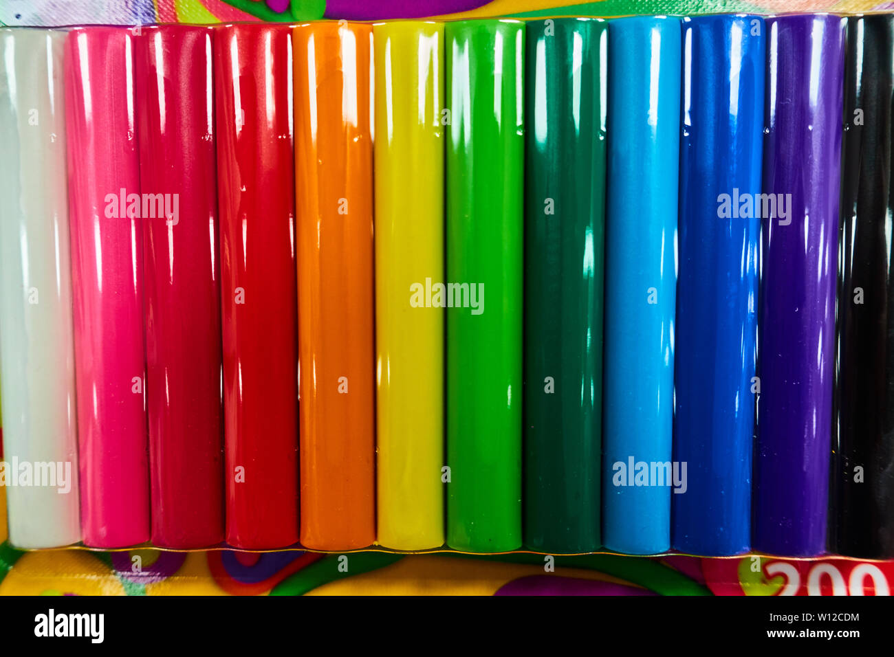 Packaging of sealed multi-colored plasticine on the store shelf Stock ...