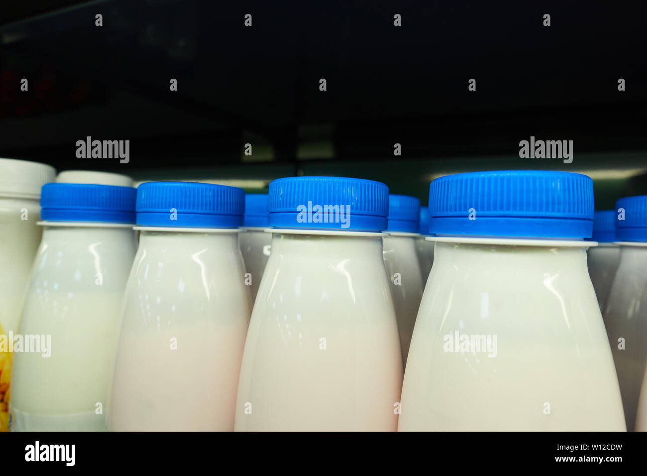 Plastic milk bottles hi-res stock photography and images - Alamy