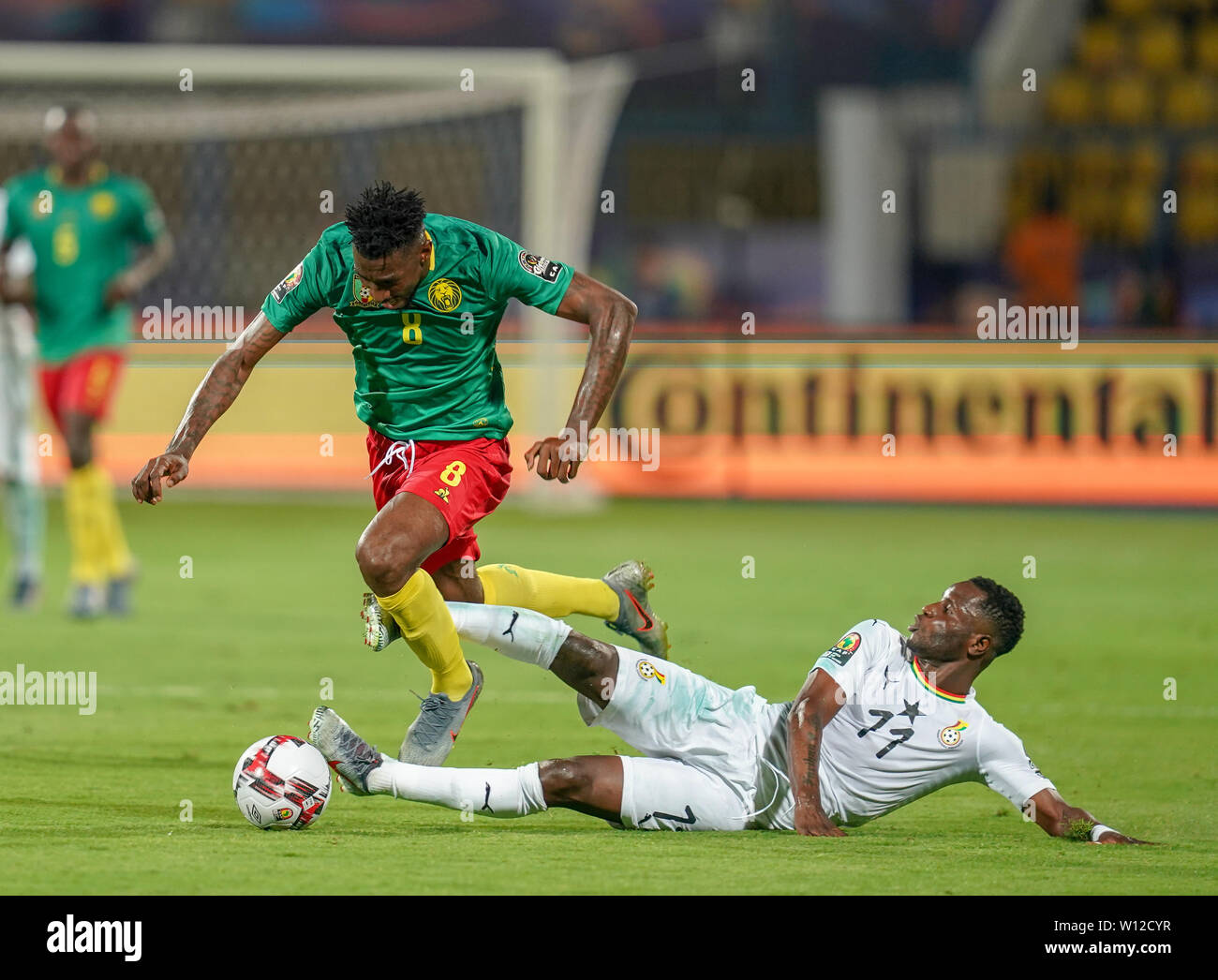 Ismailia, Egypt. 29th June, 2019. Wakaso Mubarak of Ghana fouls AndreÌ ...