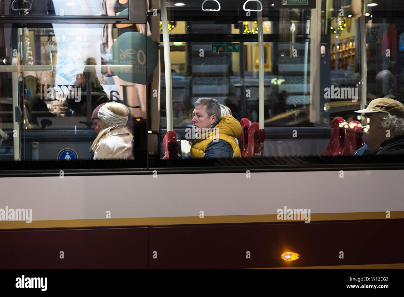 Woman traveling city bus hi-res stock photography and images - Alamy