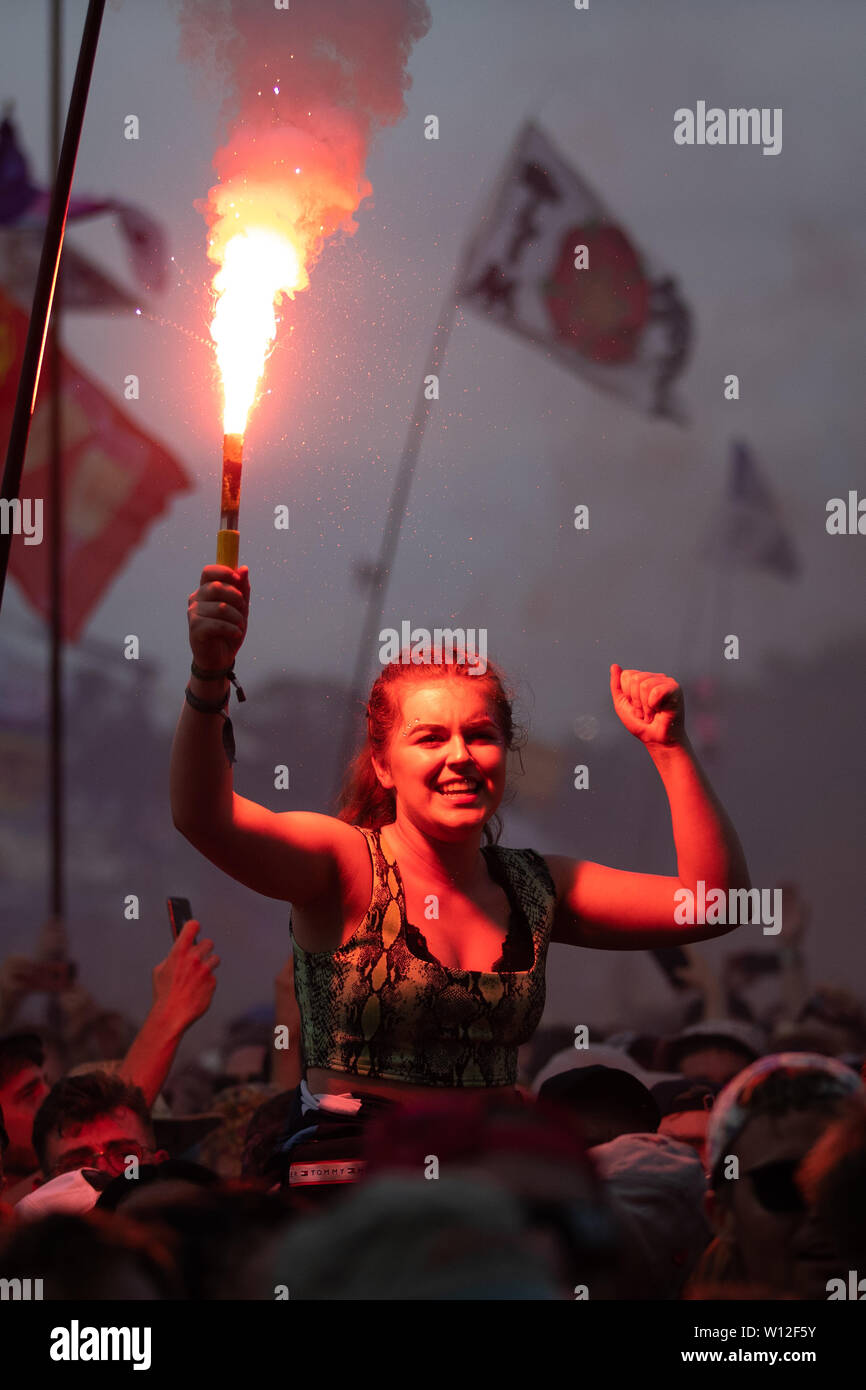 A festival goer watches Liam Gallagher on the Pyramid Stage during the ...