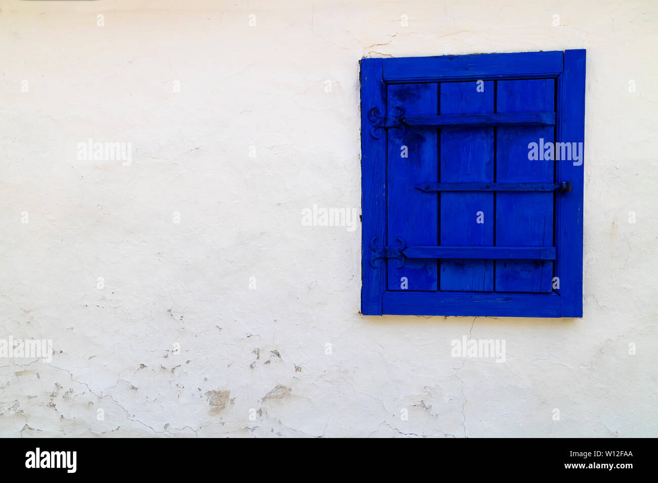 Bucharest, Romania - August 15th, 2018: A blue wooden window shade in a ...