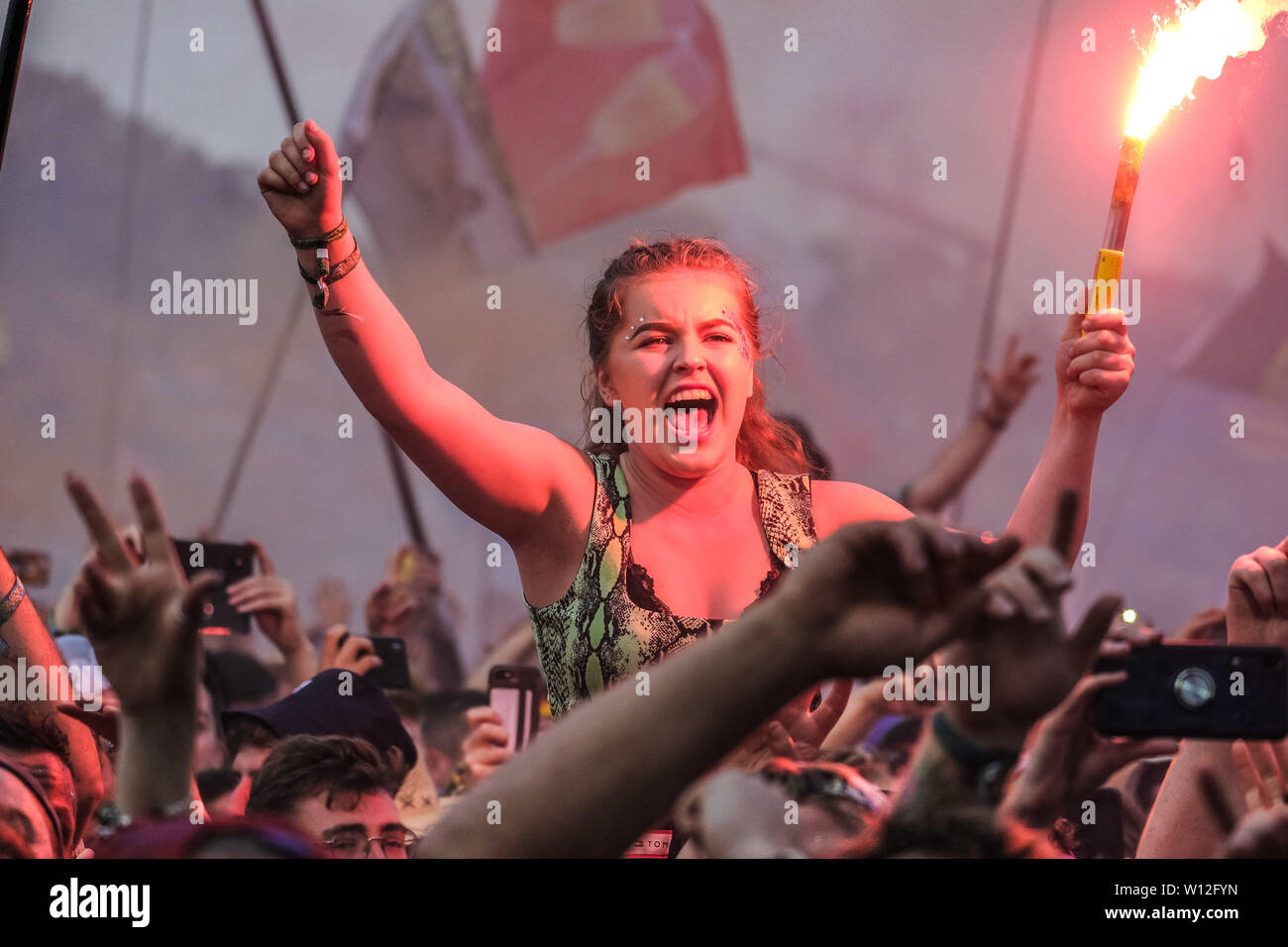 Glastonbury festival crowd flares hi-res stock photography and images ...