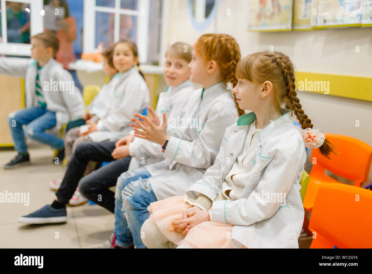 Doctor children game kindergarten hi-res stock photography and images ...