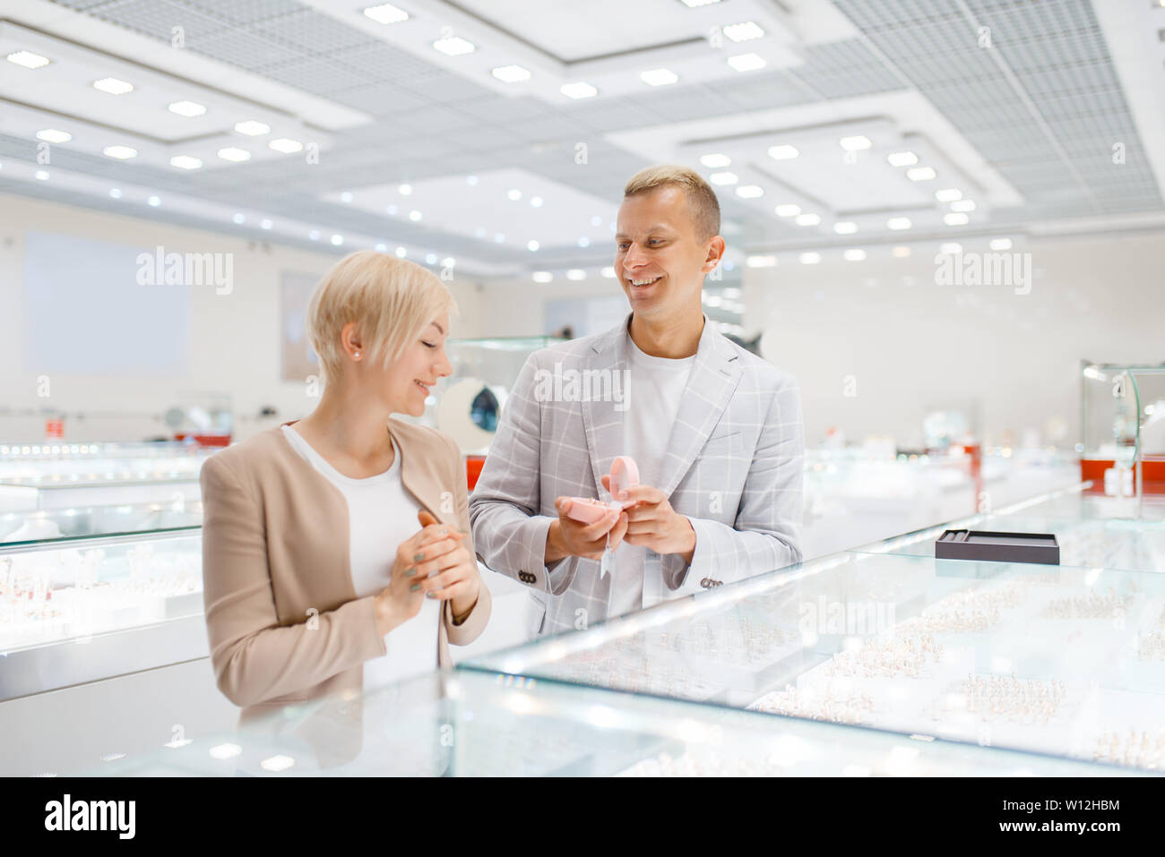 Woman buying jewellery hi-res stock photography and images - Alamy