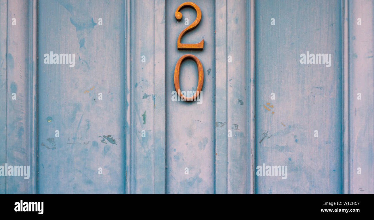 House number 20 with the twenty in bronze vertically arranged digits on ...