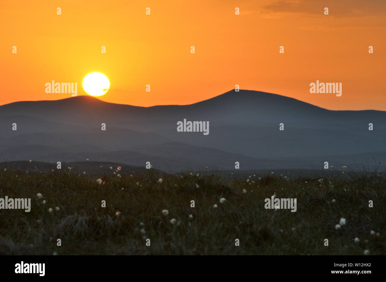 A late night summer sunset at 10:15pm over the mountains of Ben Armine ...