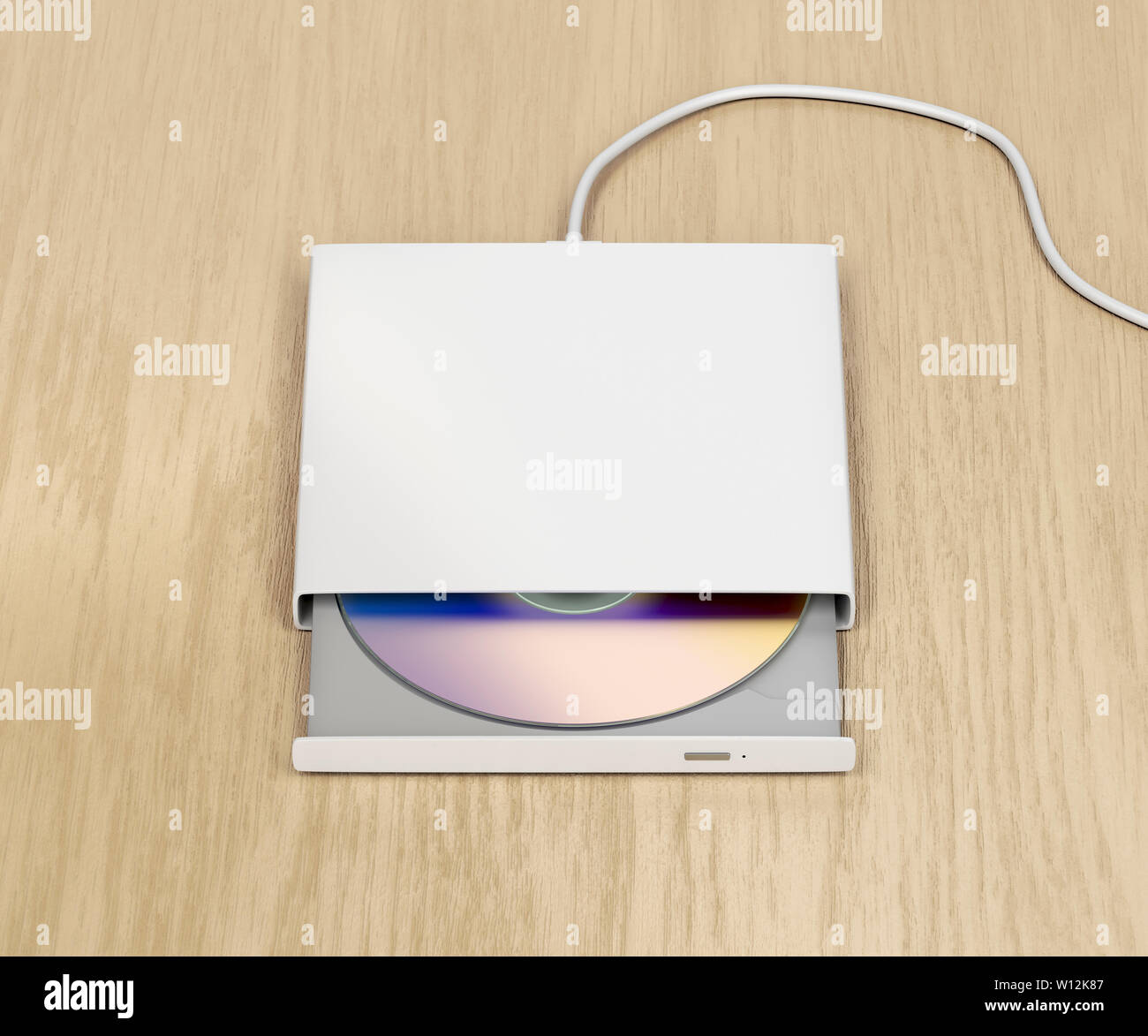 External optical disc drive on wood background Stock Photo - Alamy