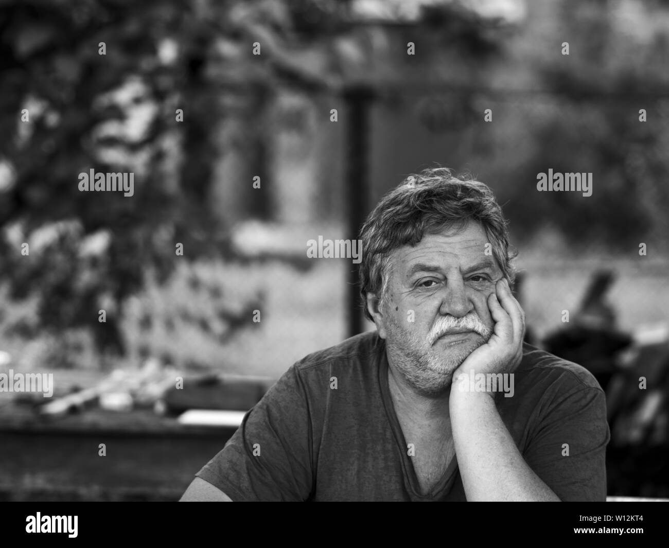 Black and white photo of a sad gray-haired Caucasian man Stock Photo ...