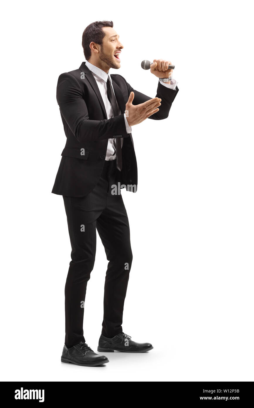 Man holding mic standing Cut Out Stock Images & Pictures - Alamy