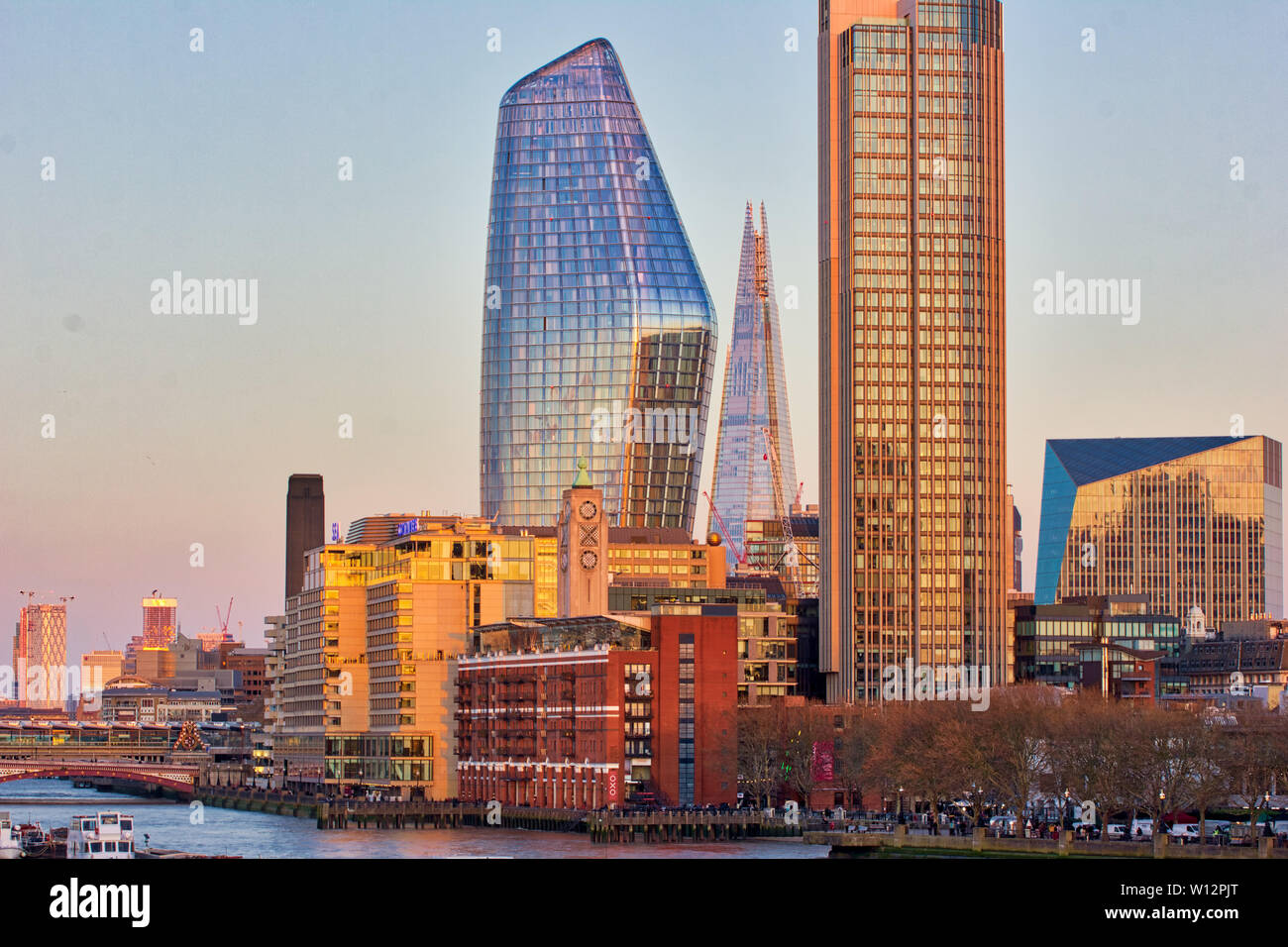 Evening sunset reflected on the modern skyscraper in london hi-res ...