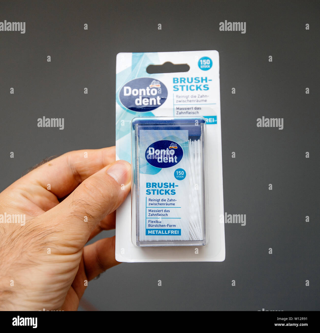 Paris, France - Jun 1, 2019: Man hand holding Brush-Sticks manufactured ...