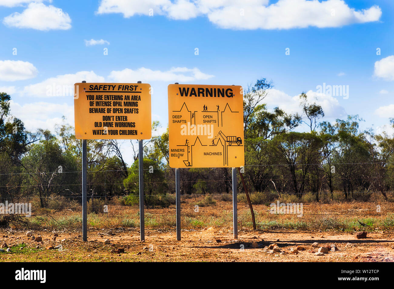 Lightning Ridge town Warning Signs at the entrance to remote area with ...