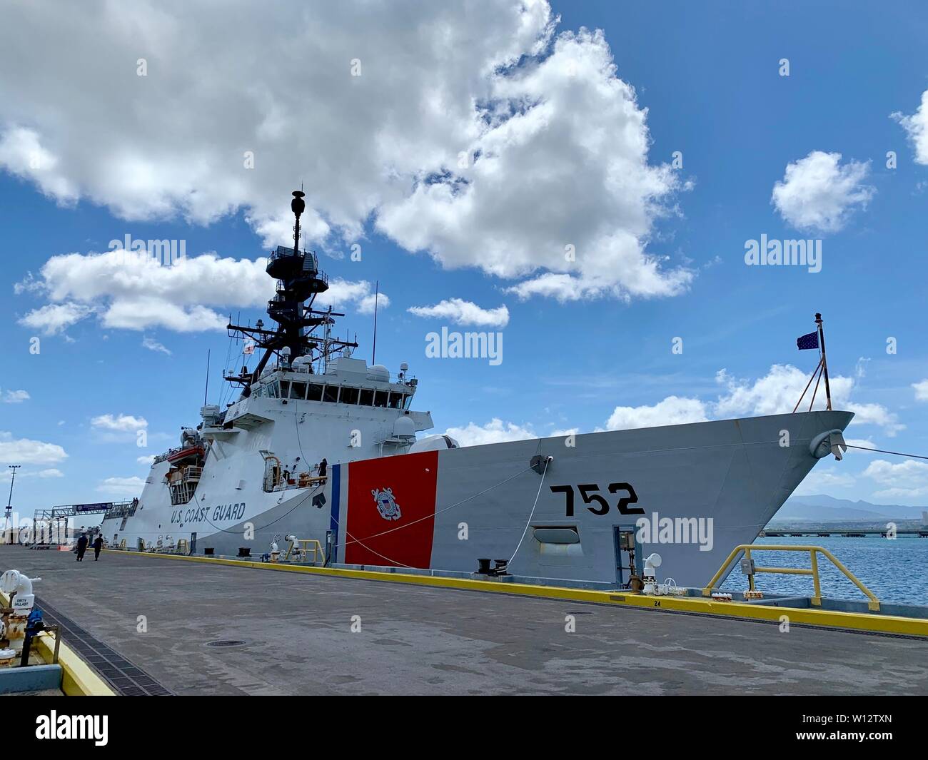 U.S. Coast Guard Cutter Stratton (WMSL 750) takes on fuel and supplies ...
