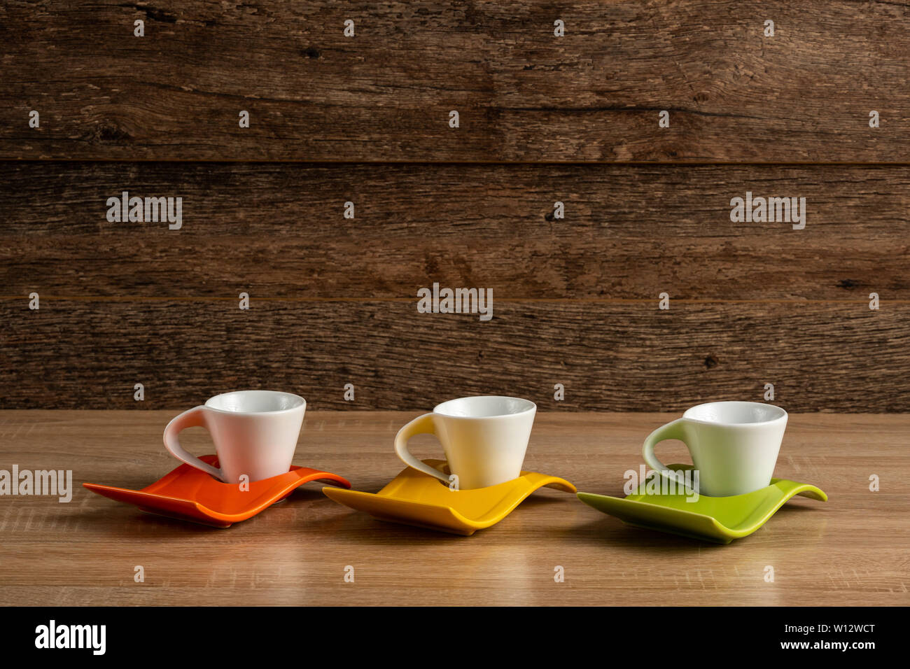 Three simple cups of coffee, side view Stock Photo - Alamy