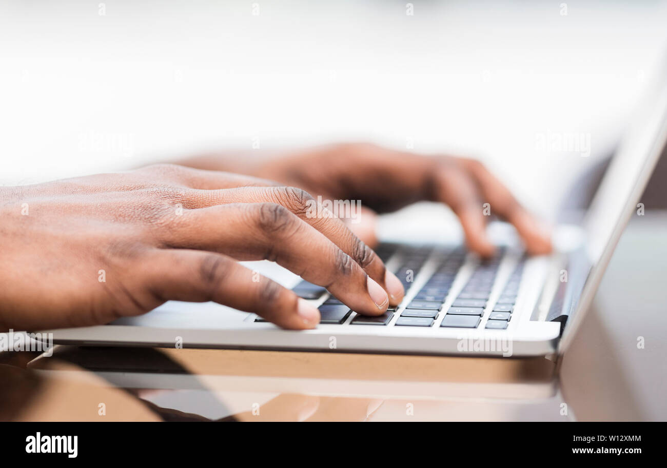 African american guy typing hi-res stock photography and images - Alamy
