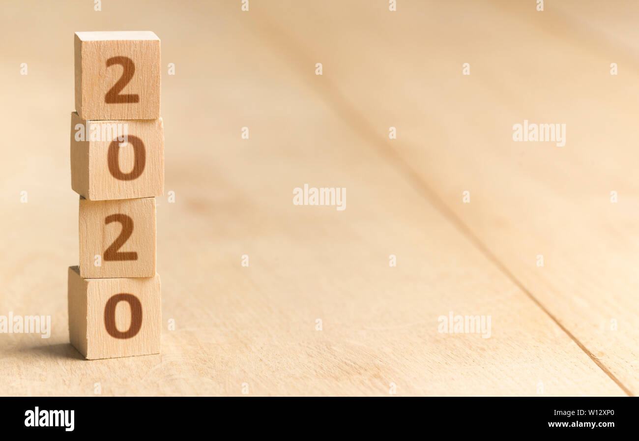 Wooden blocks with 2020 numbers standing on the floor Stock Photo - Alamy